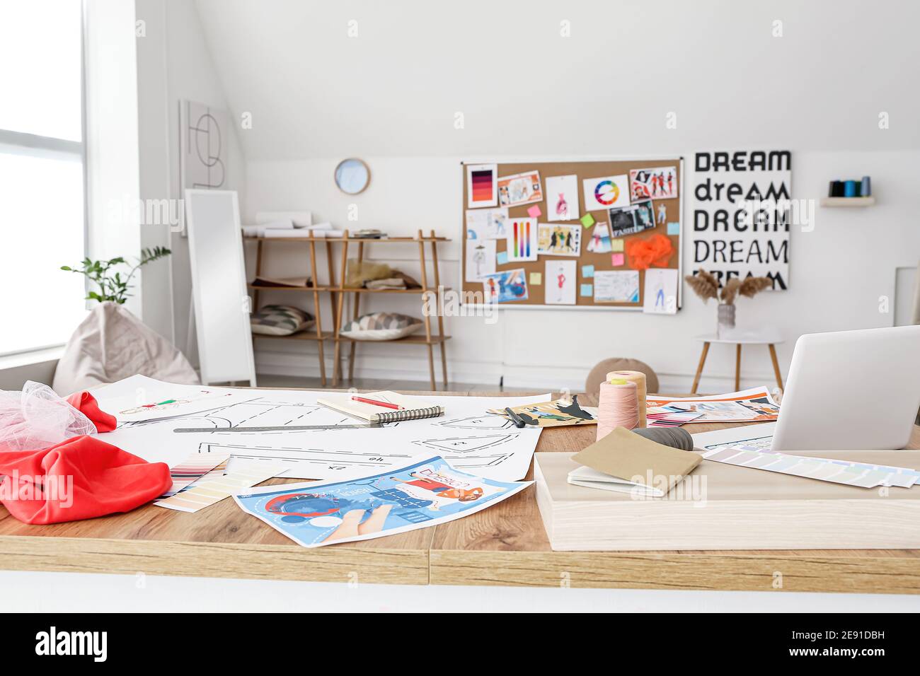 Stylish interior of fashion designer workplace Stock Photo - Alamy