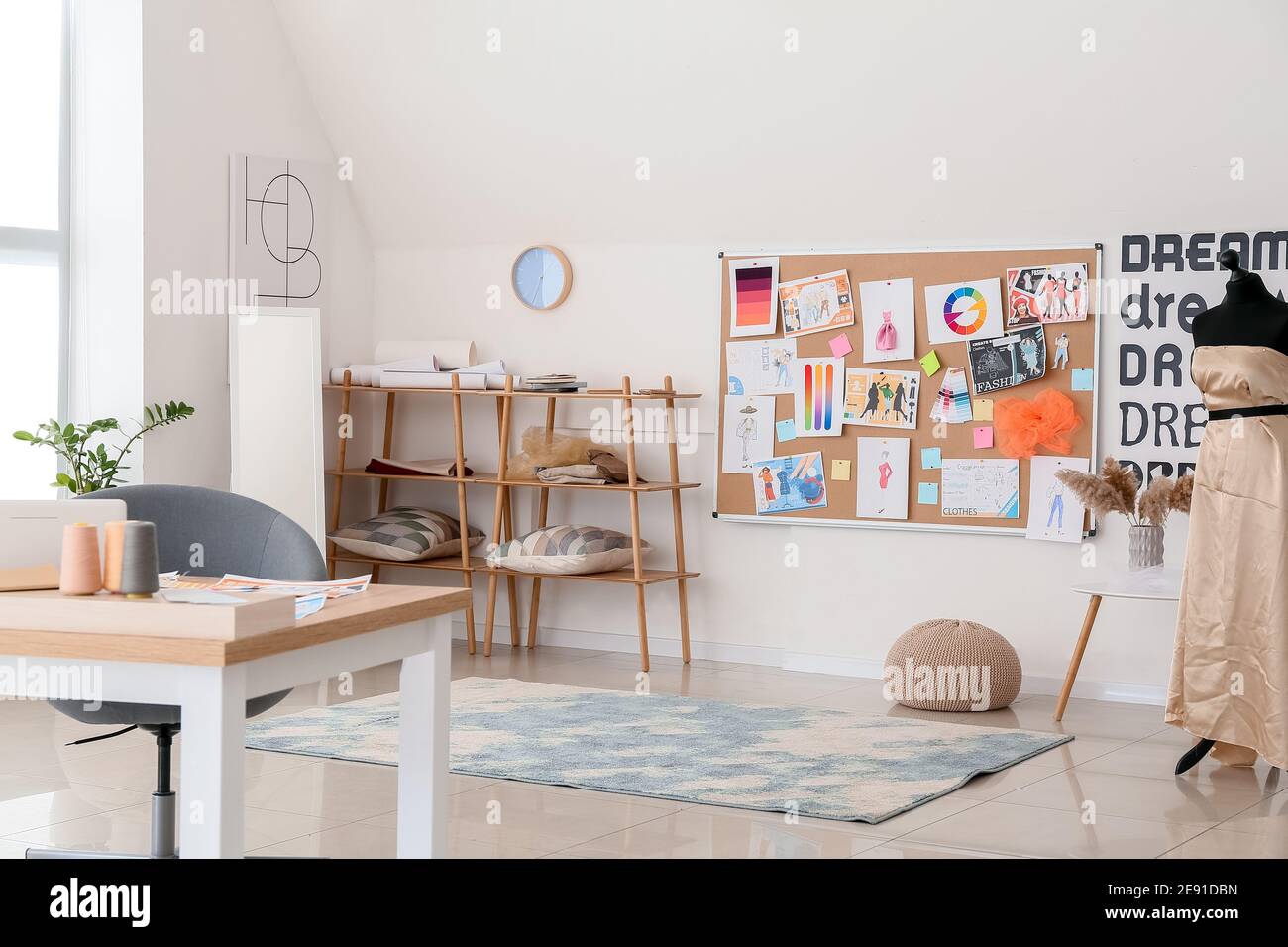 Stylish interior of fashion designer workplace Stock Photo - Alamy