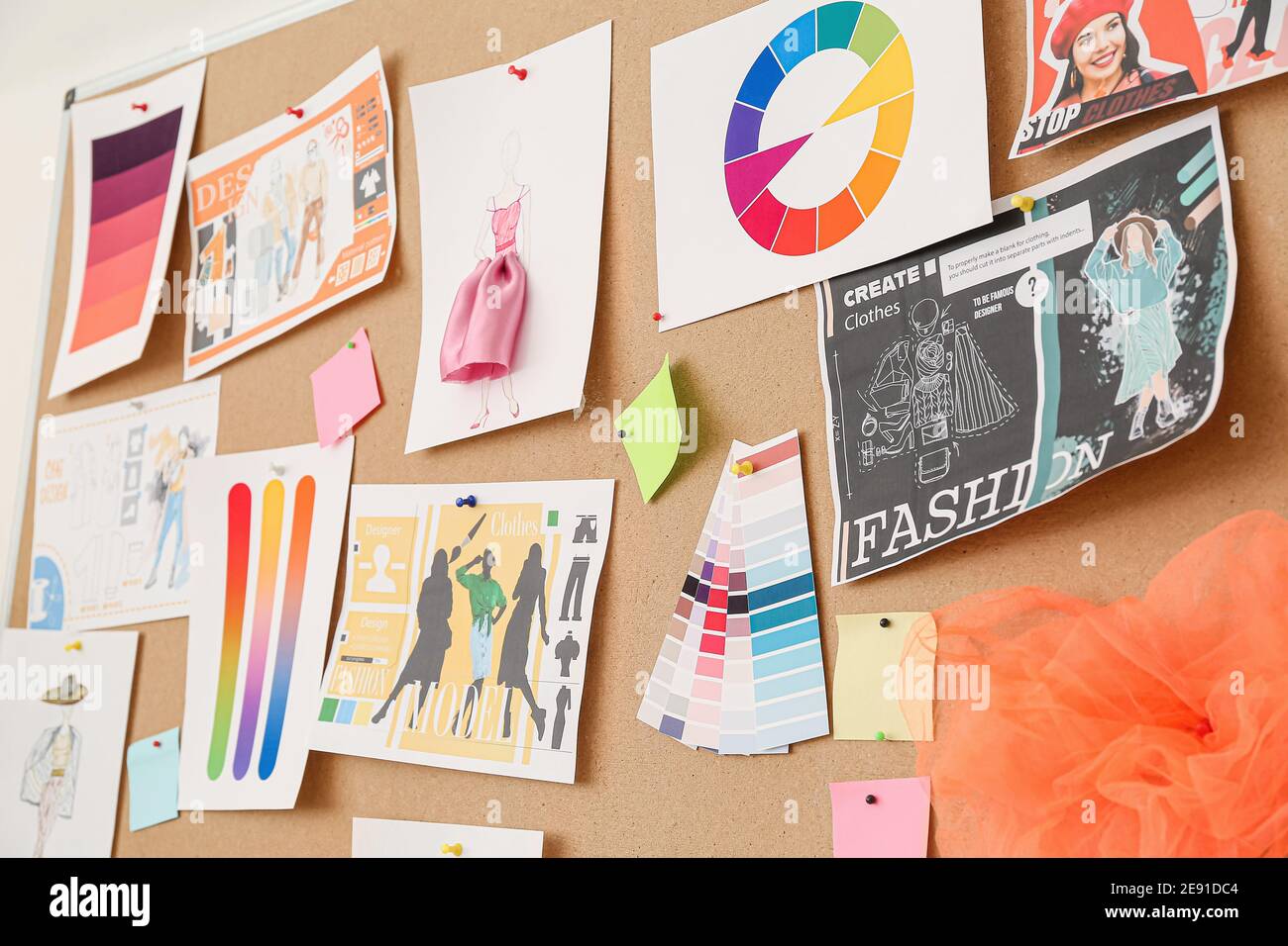 Board with pictures at fashion designer's studio Stock Photo - Alamy