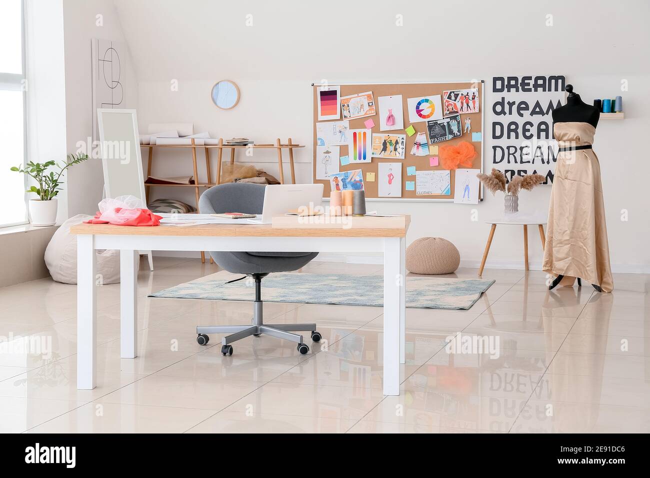 Stylish interior of fashion designer workplace Stock Photo - Alamy