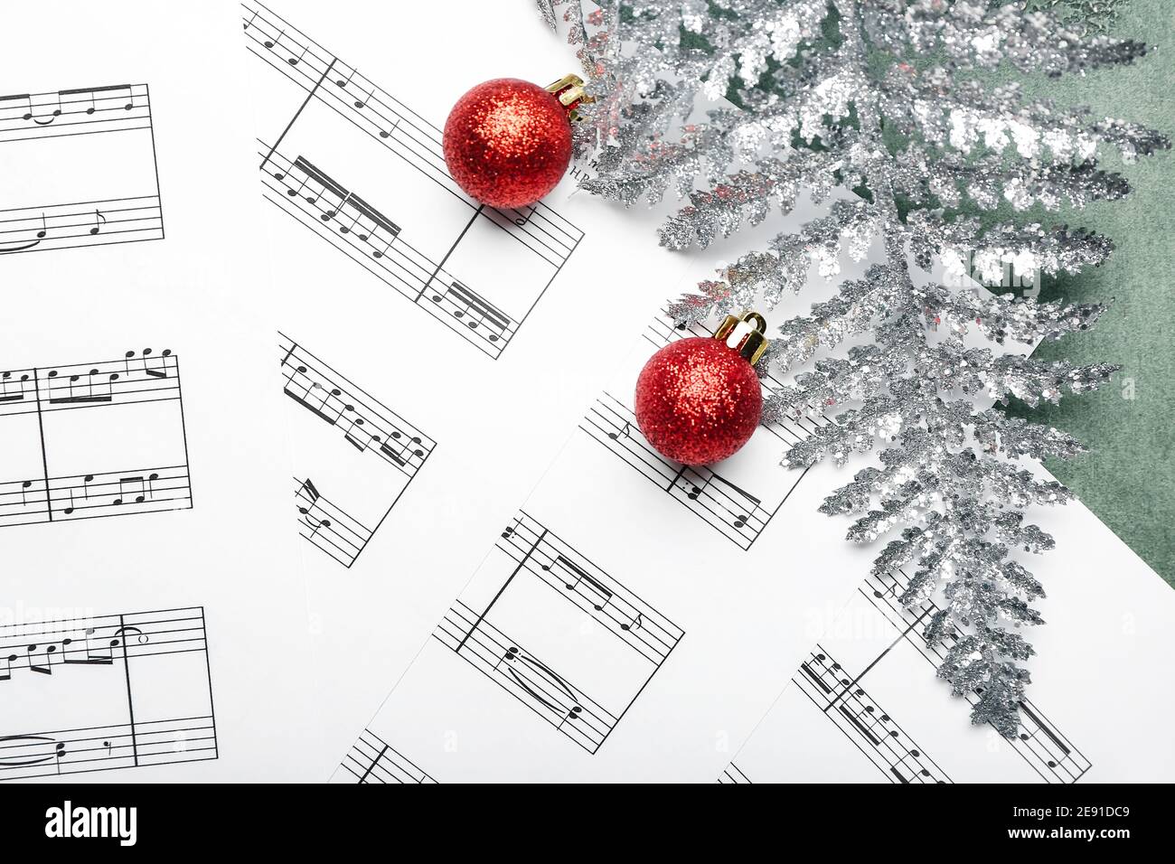 Music sheets with notes and Christmas decor Stock Photo - Alamy