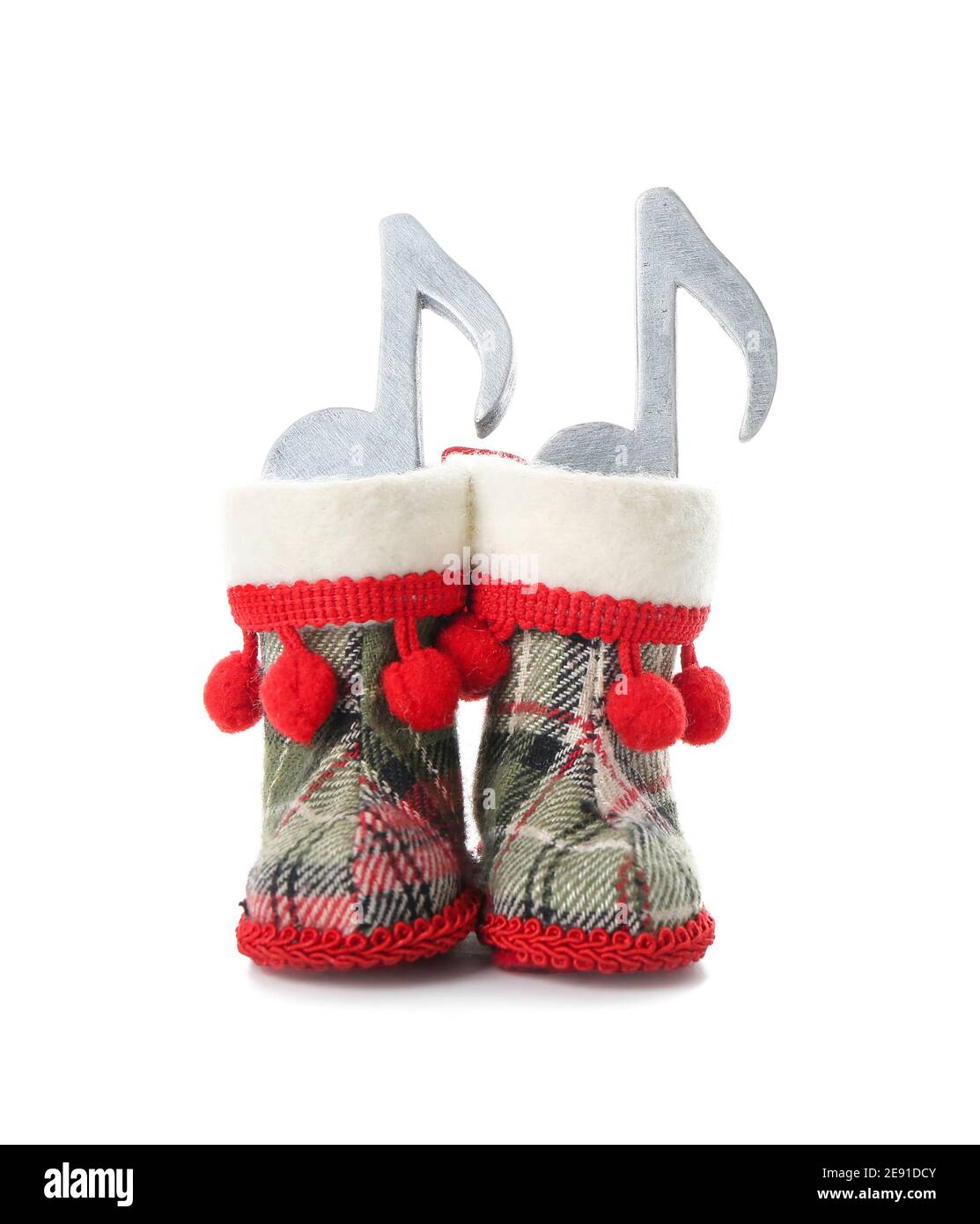 Music notes in Christmas boots isolated on white background Stock Photo ...