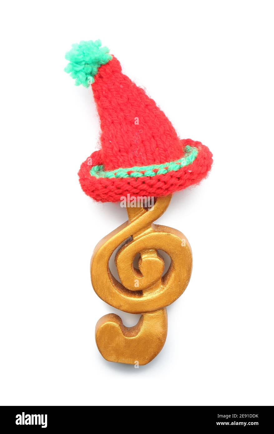 Golden music note with knitted hat isolated on white background Stock ...