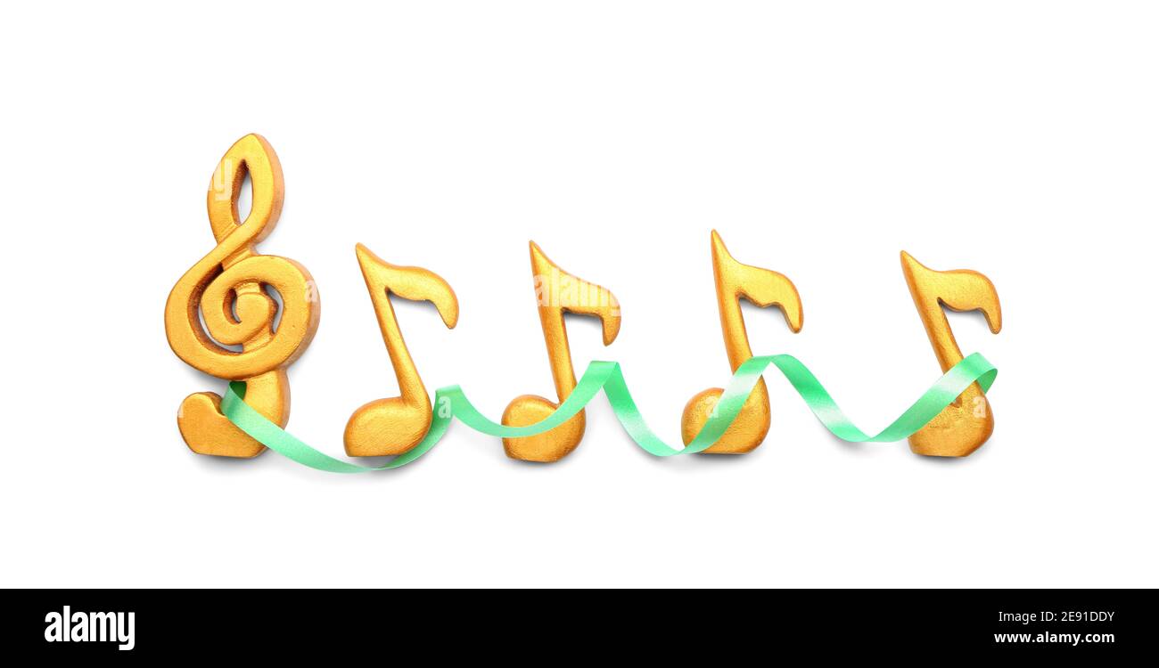 Music notes with ribbon isolated on white background Stock Photo - Alamy