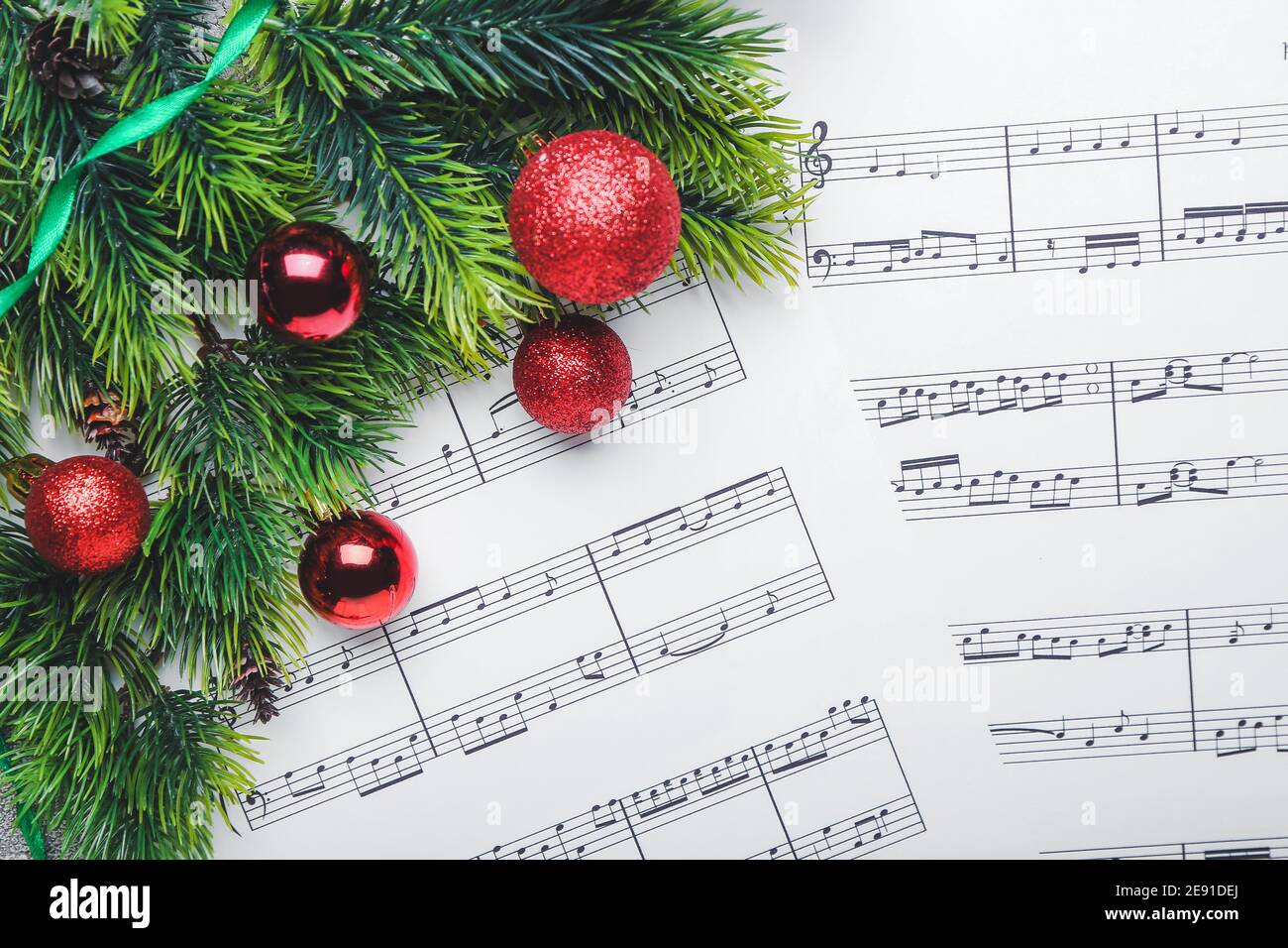 Music sheets with notes and Christmas decor Stock Photo - Alamy