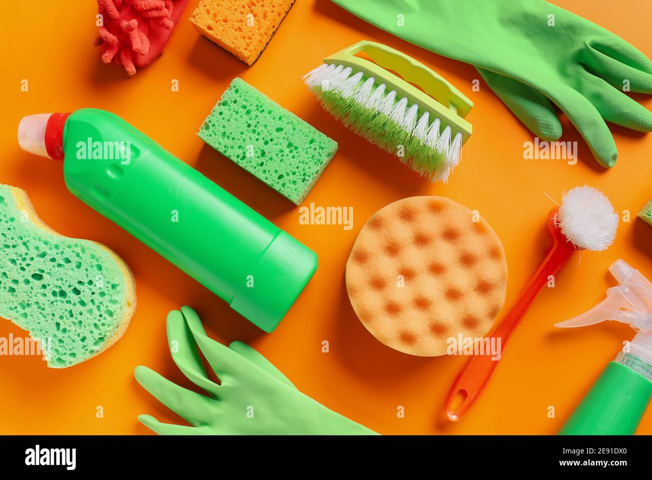 Set of cleaning supplies on color background Stock Photo - Alamy