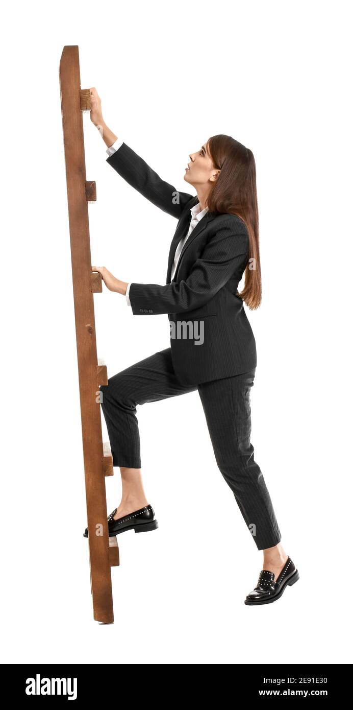 Woman climbing on ladder Cut Out Stock Images & Pictures - Alamy
