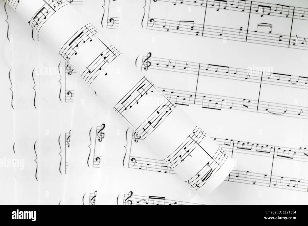White paper musical notes rolled hi-res stock photography and images ...