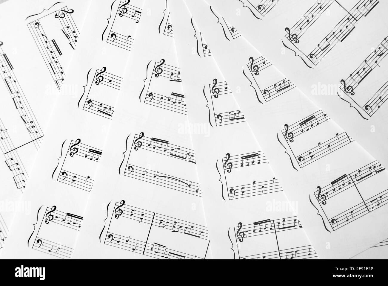 Paper sheets with music notes, closeup Stock Photo - Alamy