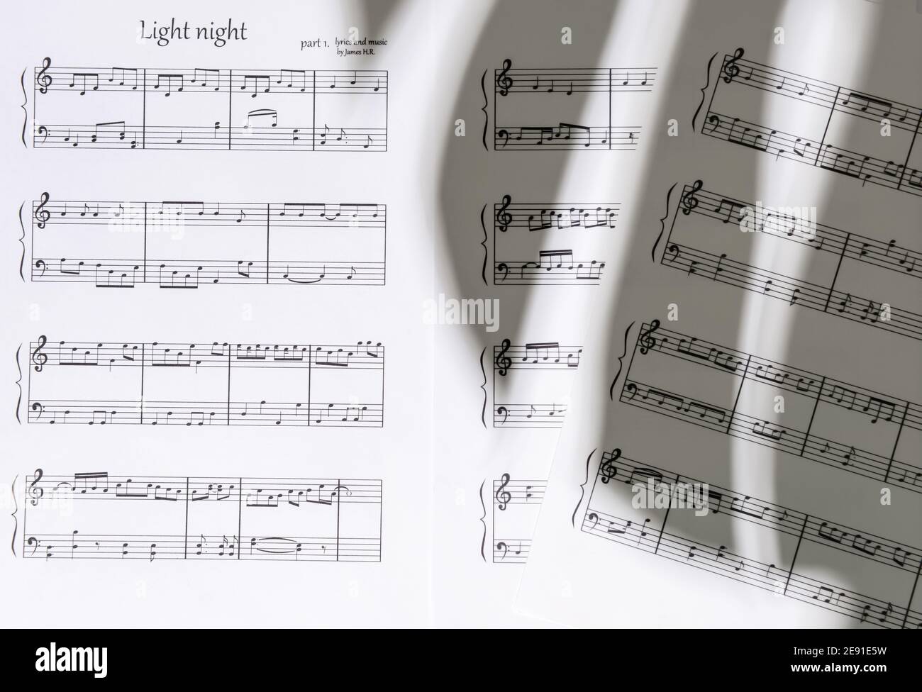 Paper sheets with music notes, closeup Stock Photo - Alamy