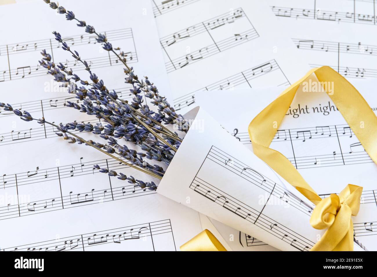 Lavender on paper sheets with music notes Stock Photo - Alamy