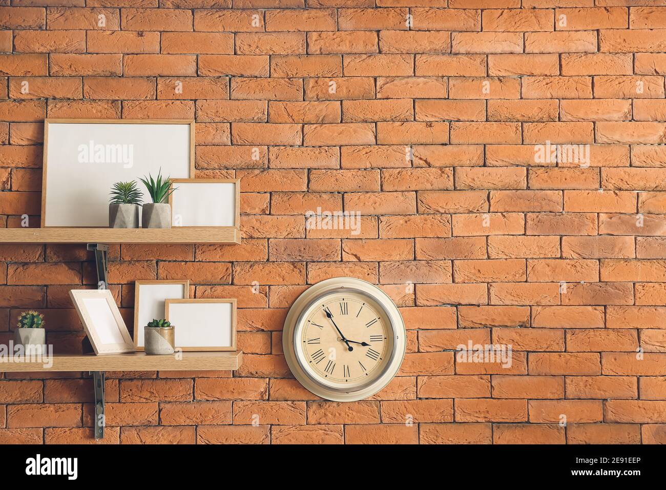 Hanging shelves on brick wall hi-res stock photography and images - Alamy