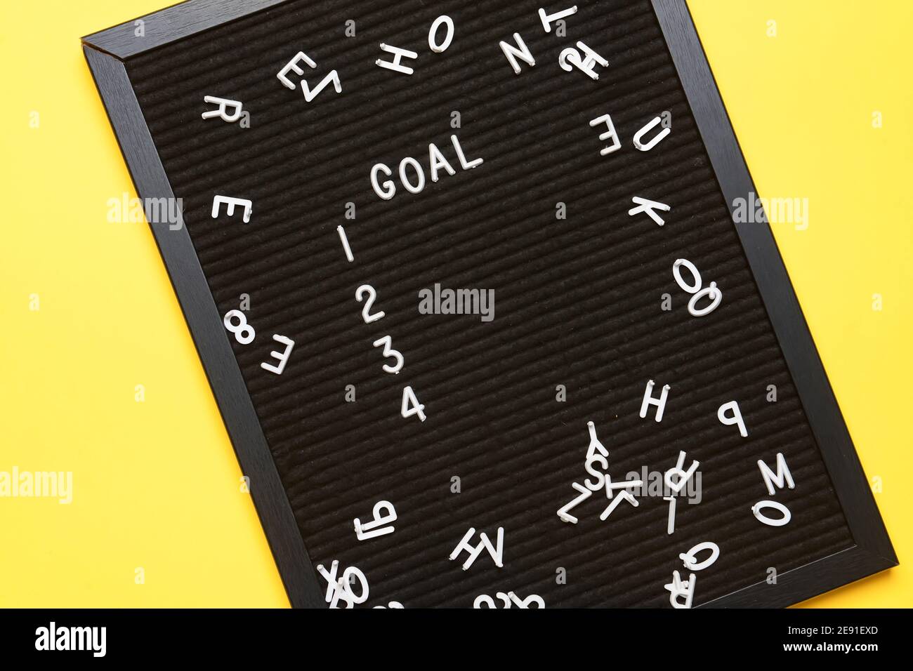 Board with empty to-do list on color background Stock Photo - Alamy