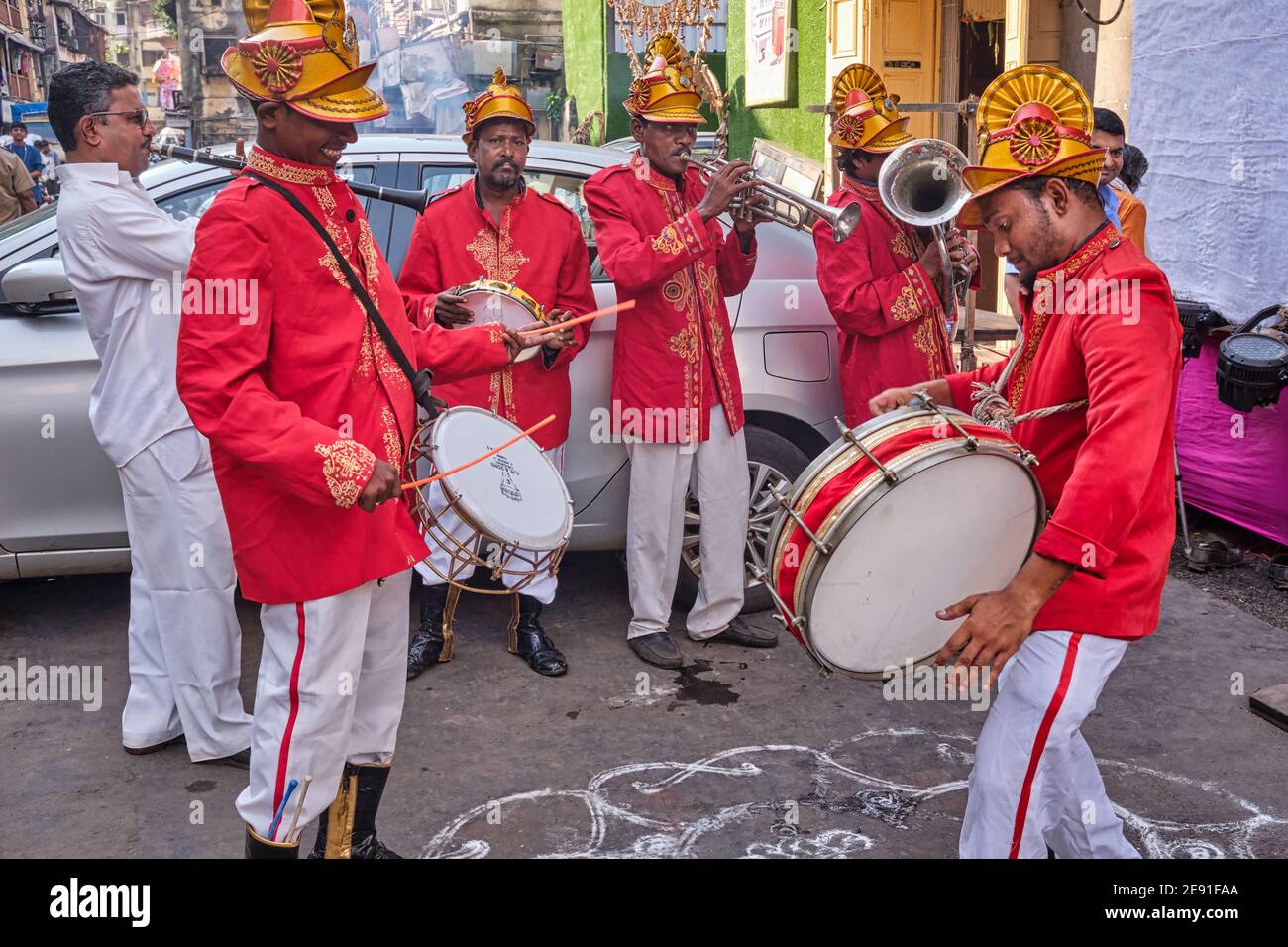 On occasion of a Hindu holiday, a red-uniformed wedding and festival ...
