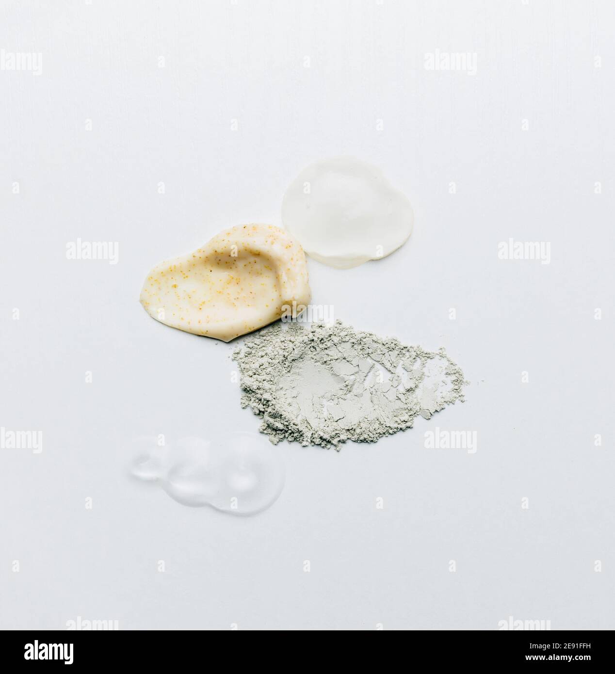 Textures from cosmetics and powder. Body Scrub. Smears on the table ...