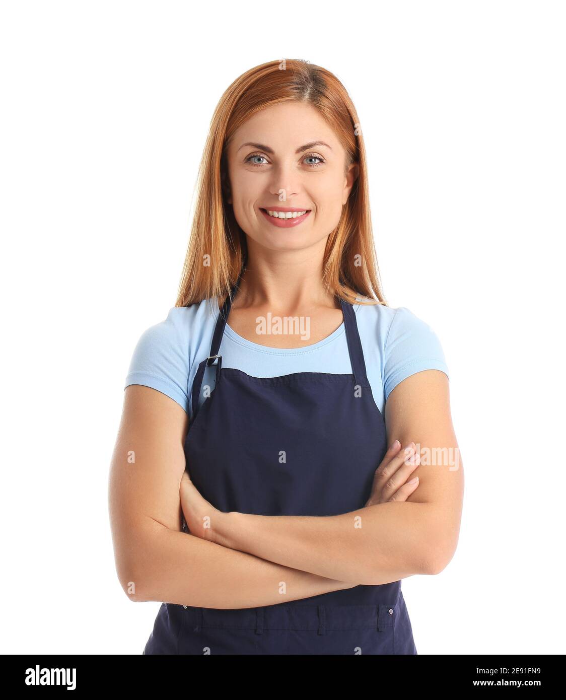 Beautiful young woman wearing apron on white background Stock Photo - Alamy