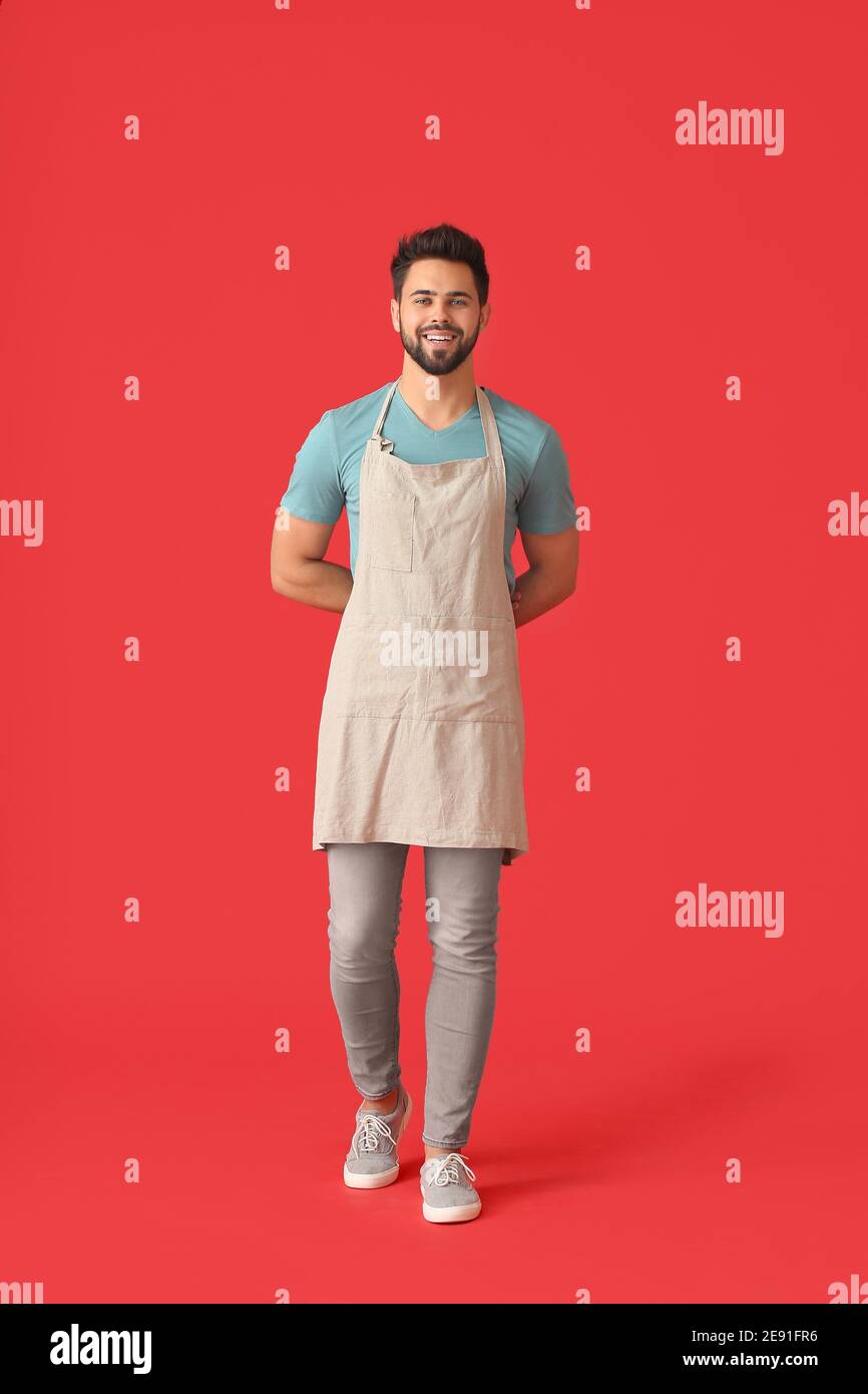 Man wearing red apron hi-res stock photography and images - Alamy