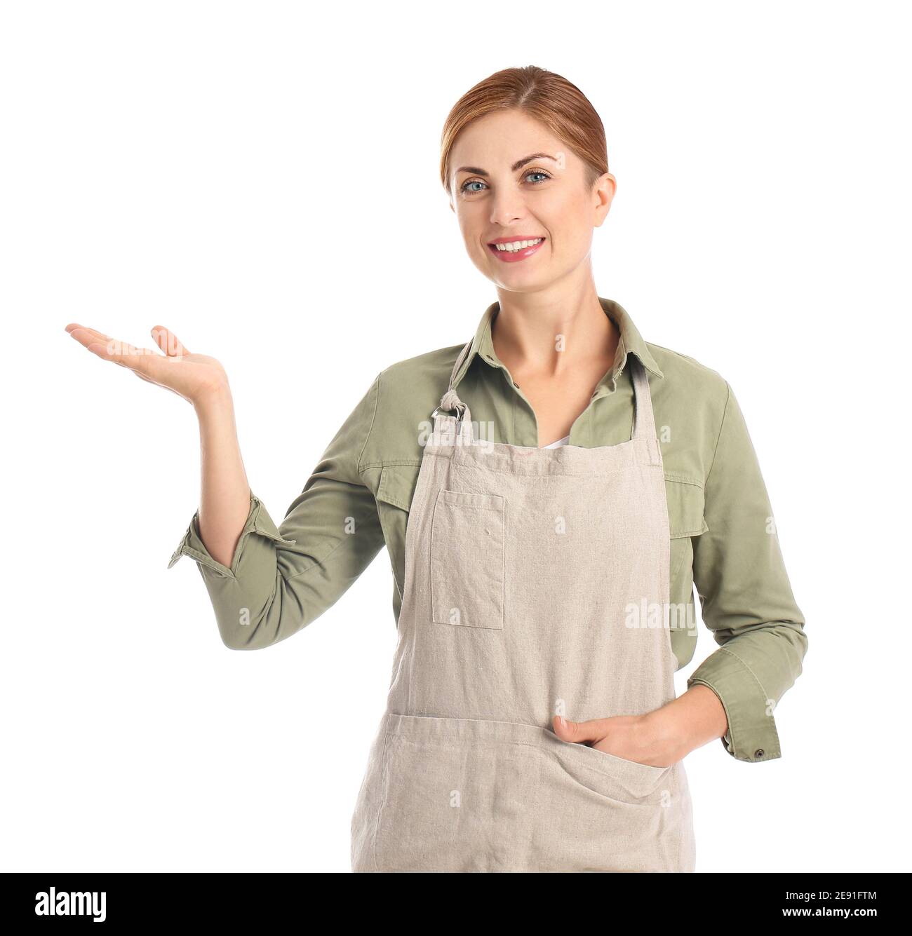 Beautiful young woman showing something on white background Stock Photo ...