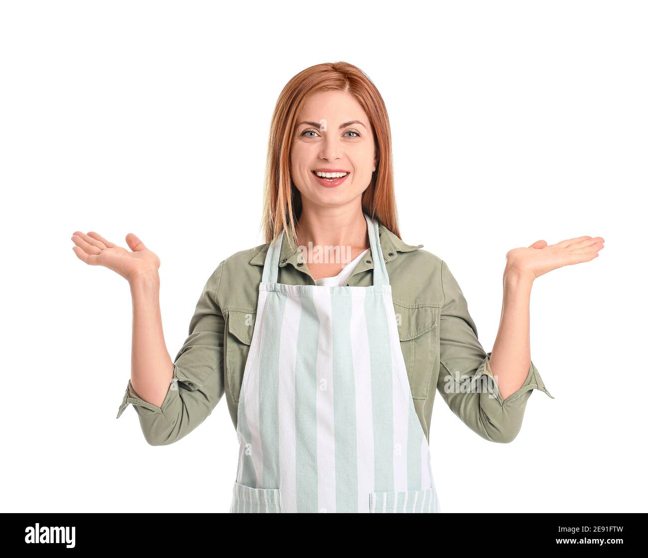 Beautiful young woman showing something on white background Stock Photo ...