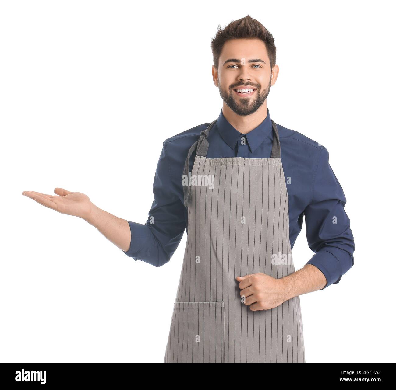 Young man showing something on white background Stock Photo - Alamy