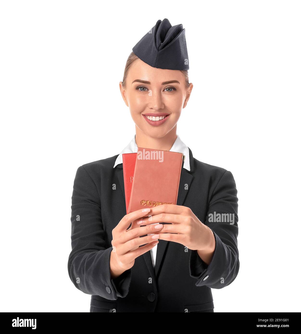 Beautiful stewardess with passports on white background Stock Photo - Alamy
