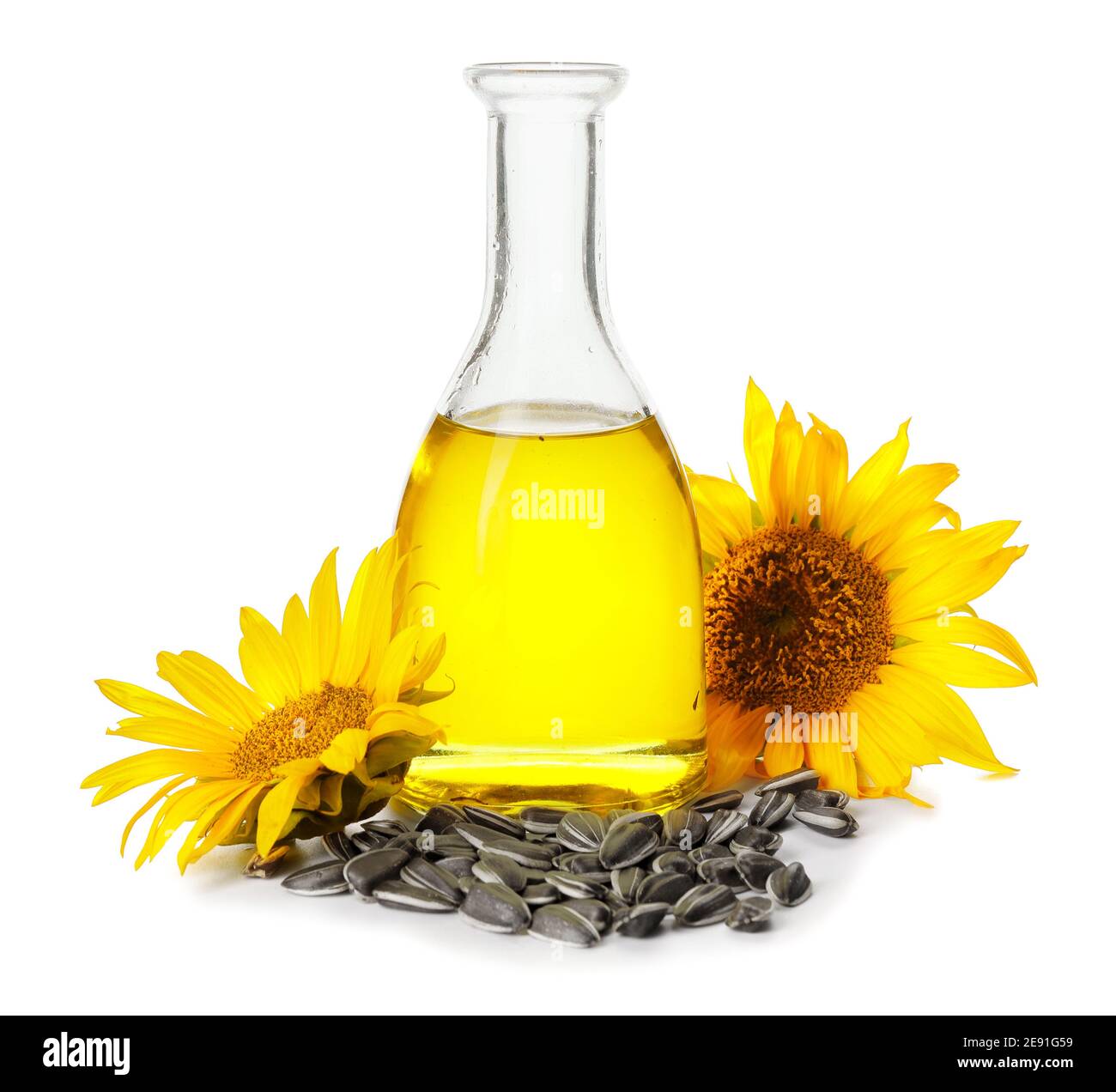 Bottle of oil, seeds and sunflowers on white background Stock Photo - Alamy