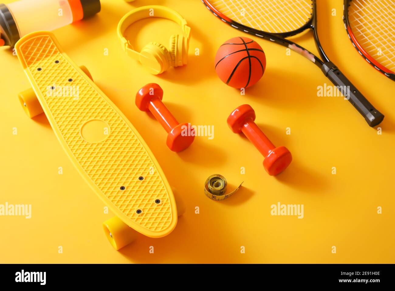 Set of sports equipment on color background Stock Photo - Alamy