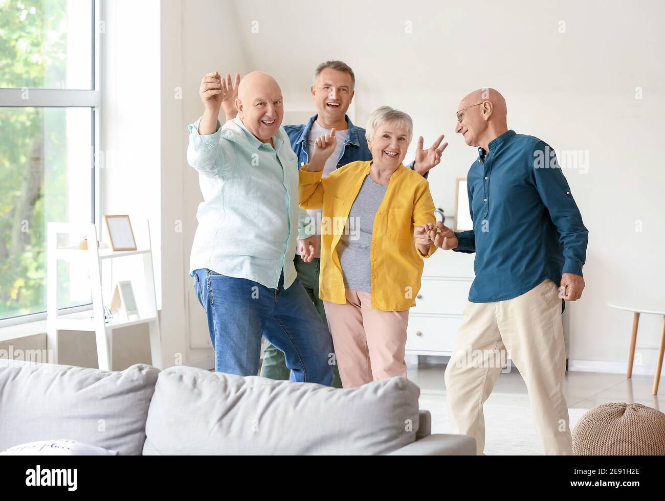 Senior people having fun at home Stock Photo - Alamy
