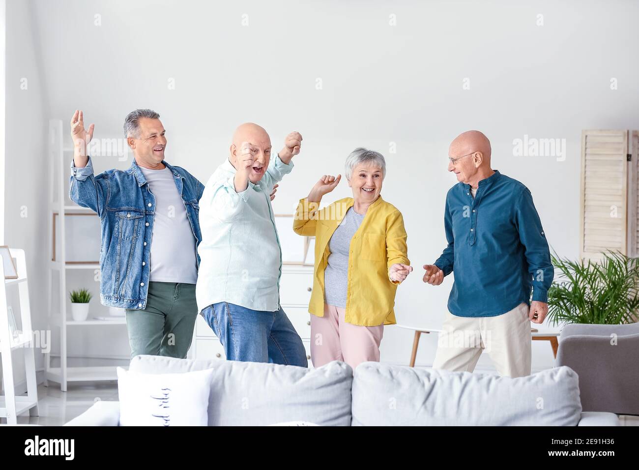 Senior people having fun at home Stock Photo - Alamy