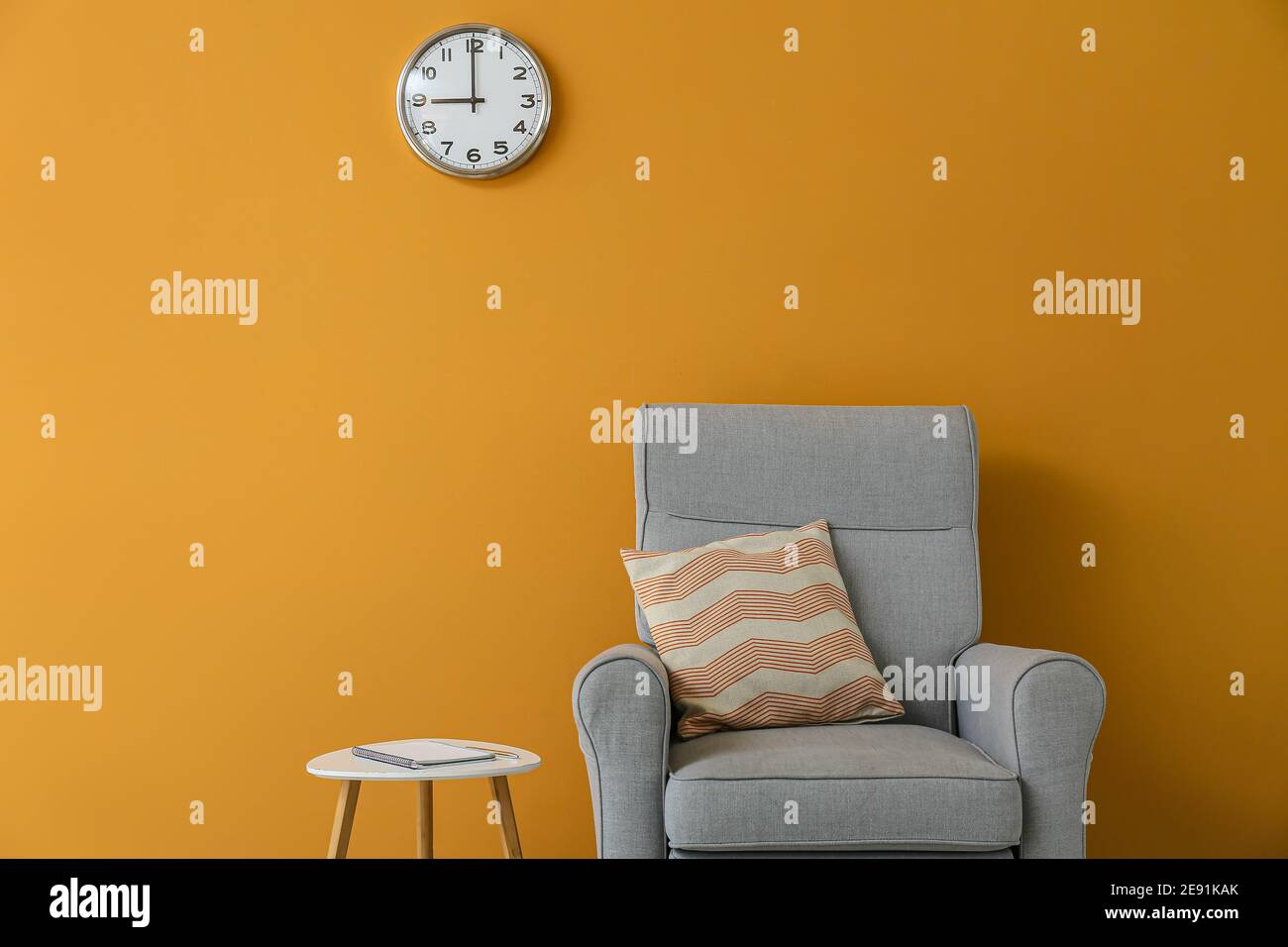 Interior of room with comfortable armchair Stock Photo - Alamy