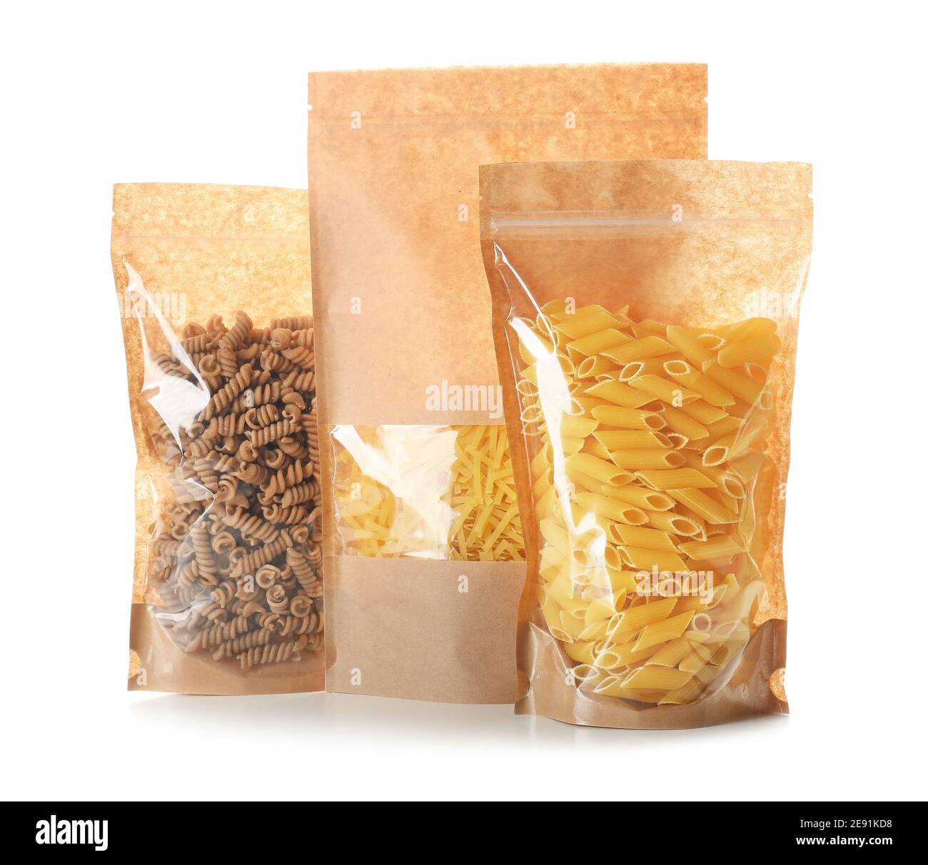Paper bags with different pasta on white background Stock Photo - Alamy