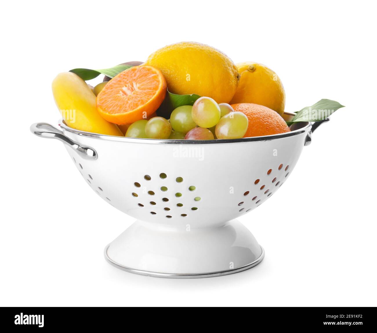 Colander with different fruits on white background Stock Photo - Alamy