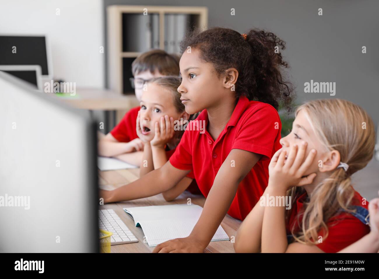 Little children during lesson in classroom Stock Photo - Alamy