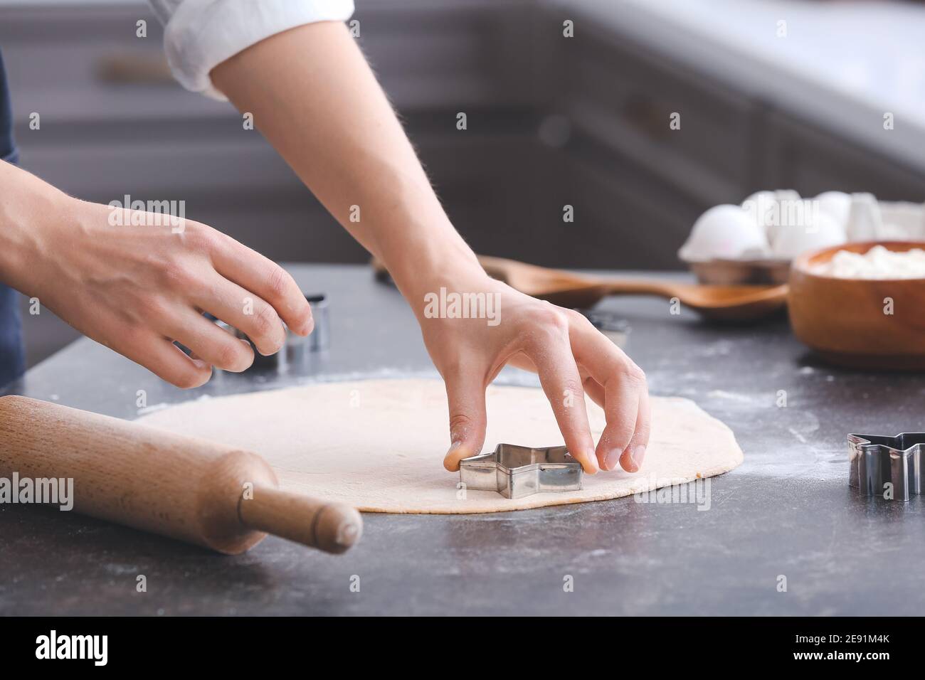 Woman making cookies cutters hi-res stock photography and images - Alamy