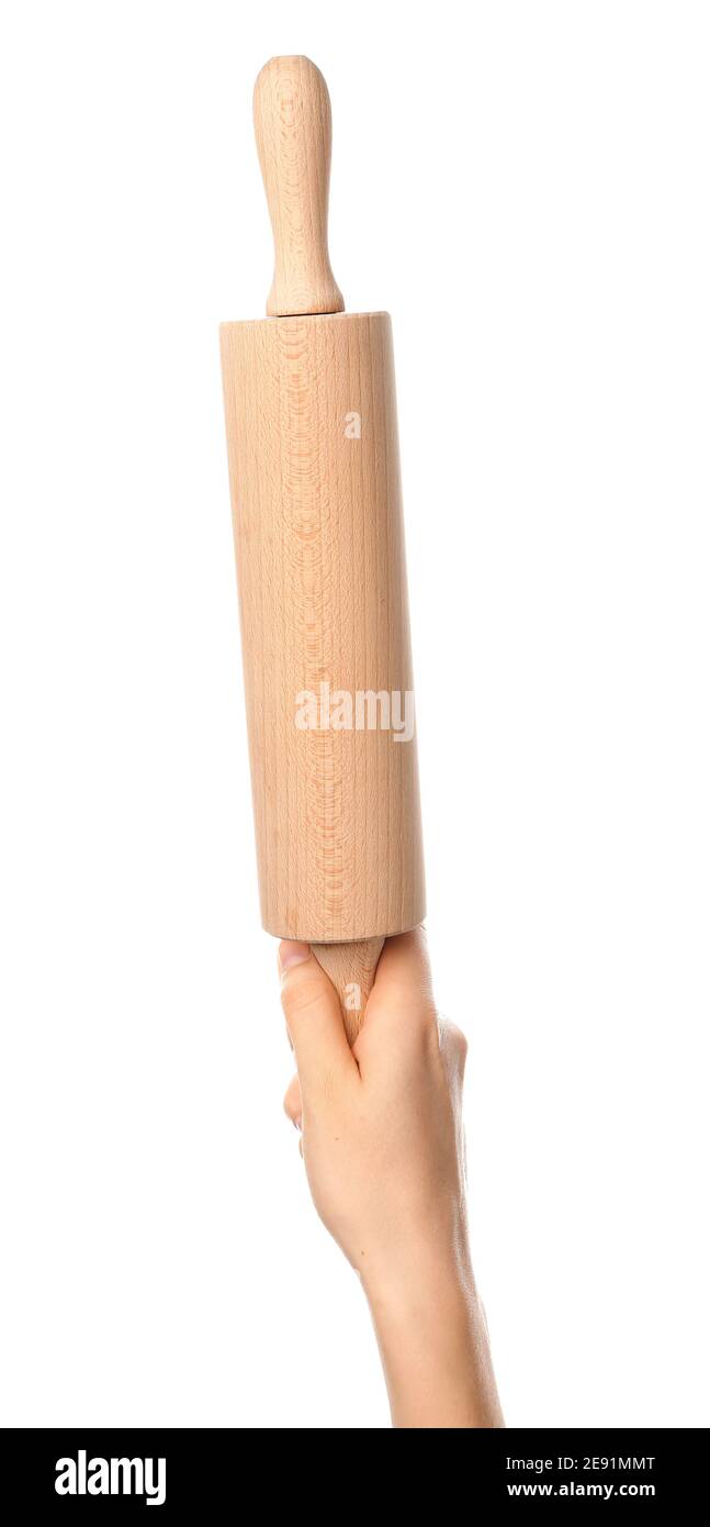 Female hand with rolling pin on white background Stock Photo - Alamy