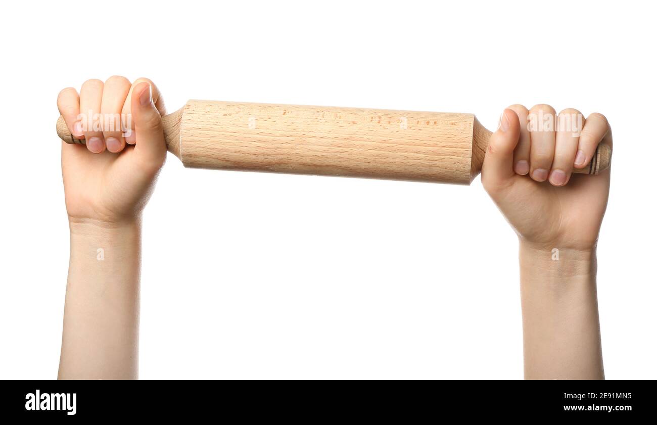 Female hands with rolling pin on white background Stock Photo - Alamy