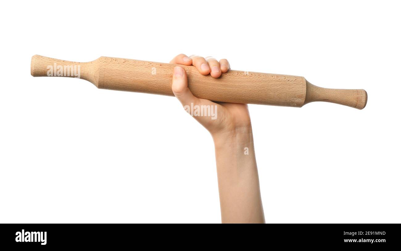 Female hand with rolling pin on white background Stock Photo - Alamy