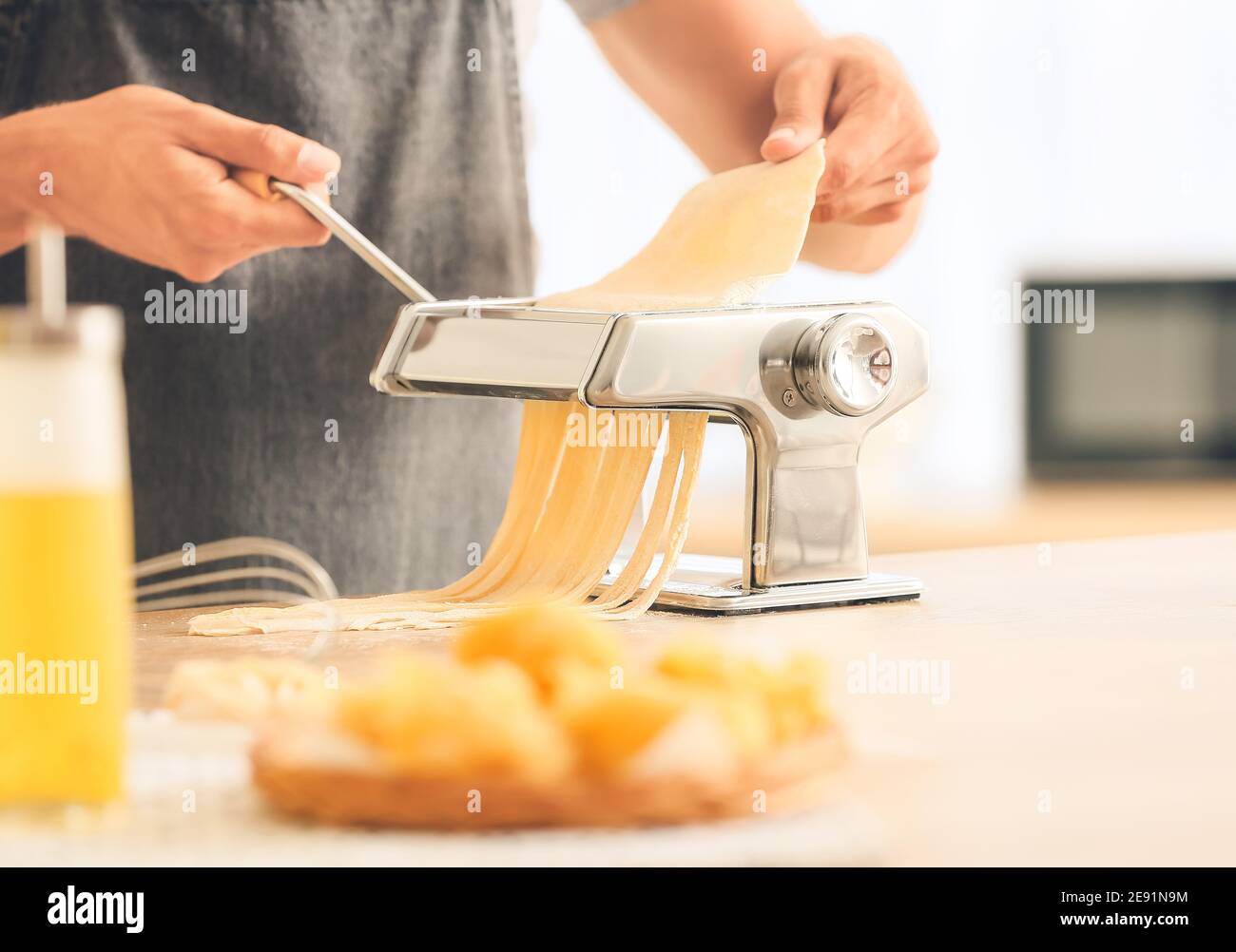 Man making fresh pasta on hi-res stock photography and images - Alamy