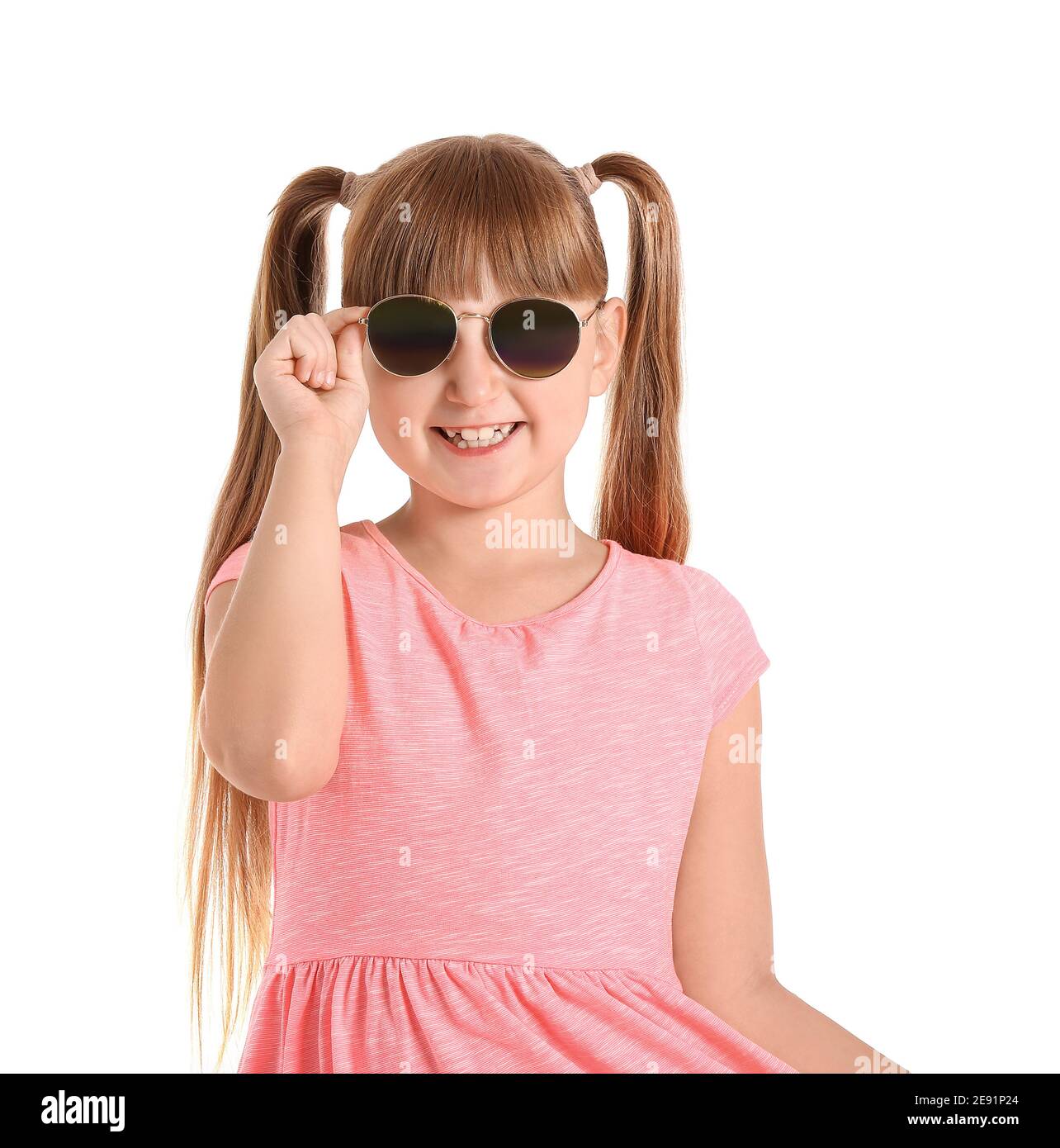 Cute little girl wearing stylish sunglasses against white background ...