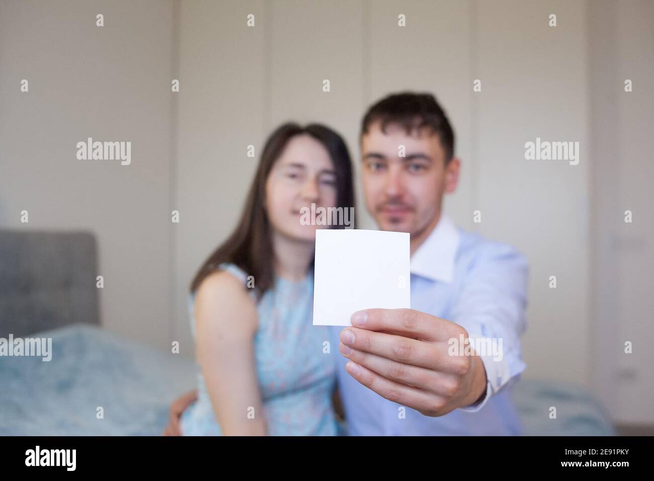 Holding sheet hi-res stock photography and images - Alamy