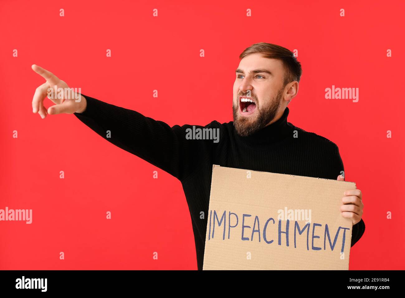 Protesting young man on color background. Impeachment concept Stock ...