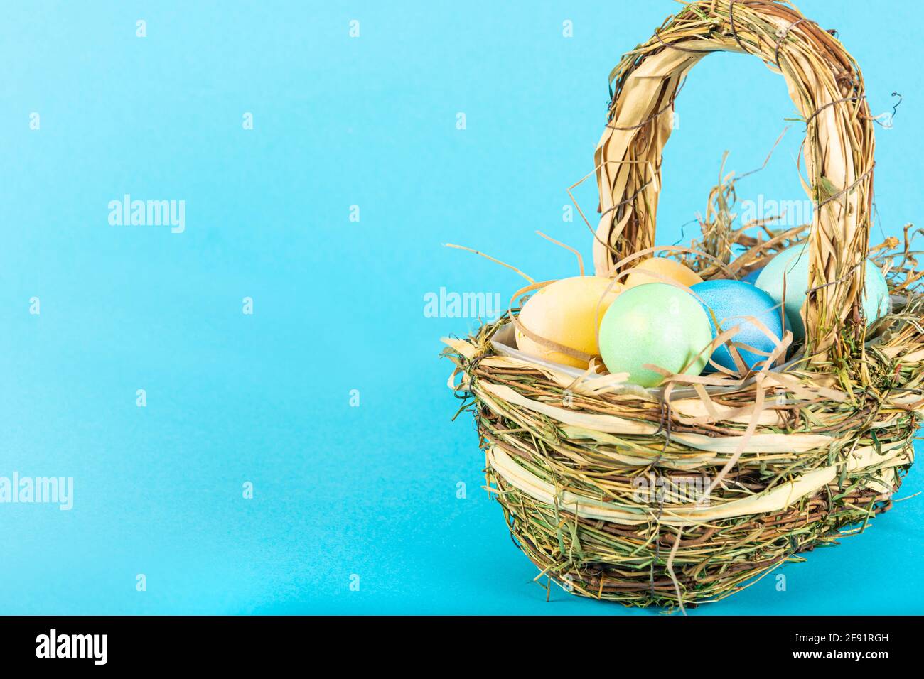 Colorful background with Easter eggs on blue background. Happy Easter ...