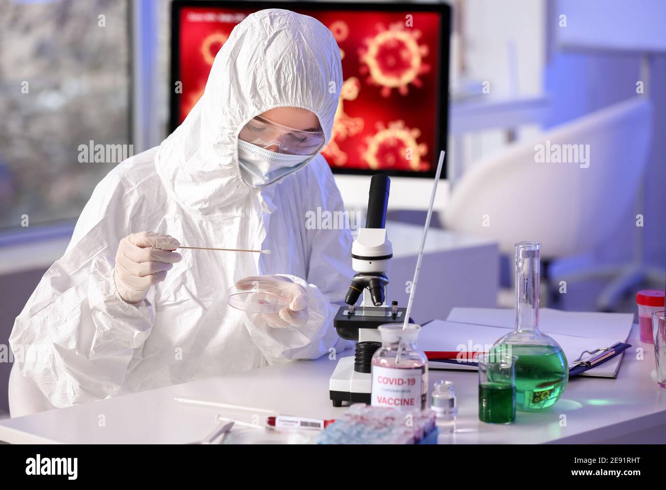 Scientist working with sample in laboratory Stock Photo - Alamy