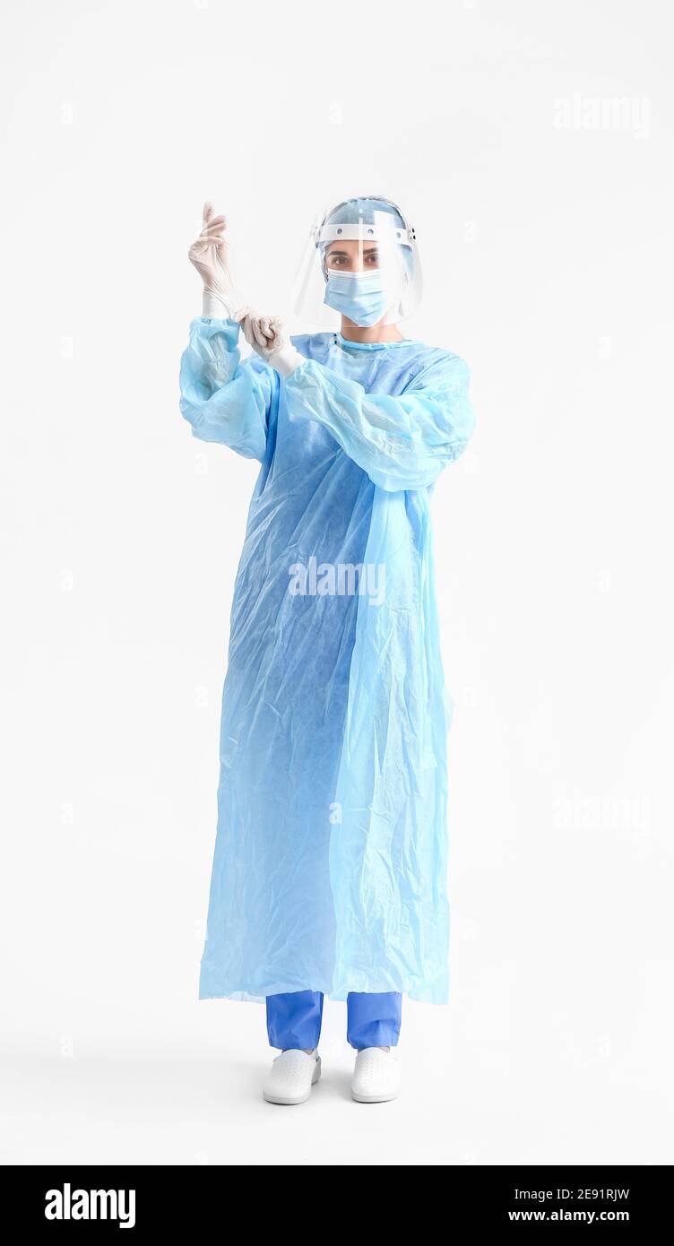 Portrait of female surgeon on light background Stock Photo - Alamy