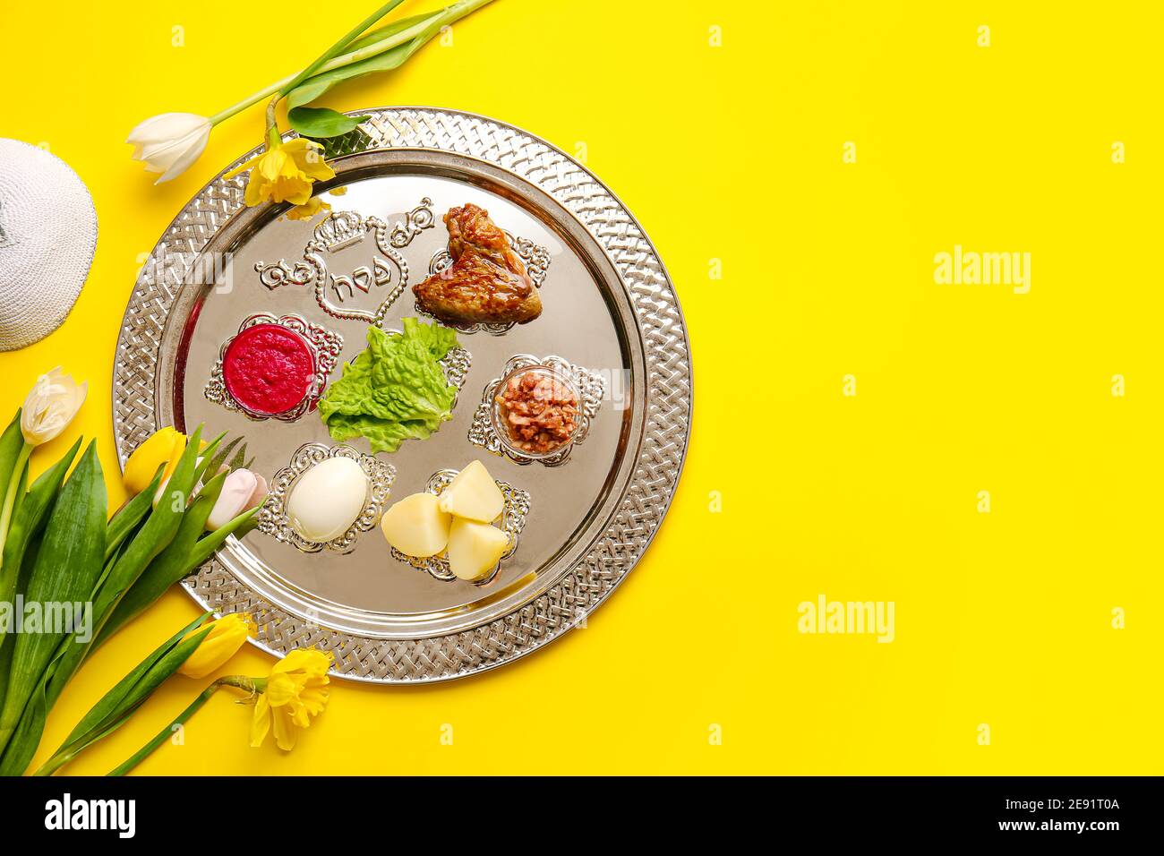 Passover Seder plate with traditional food on color background Stock ...