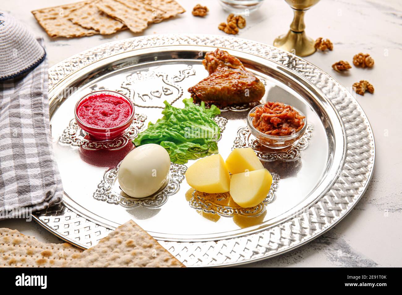 Passover Seder plate with traditional food on table Stock Photo - Alamy