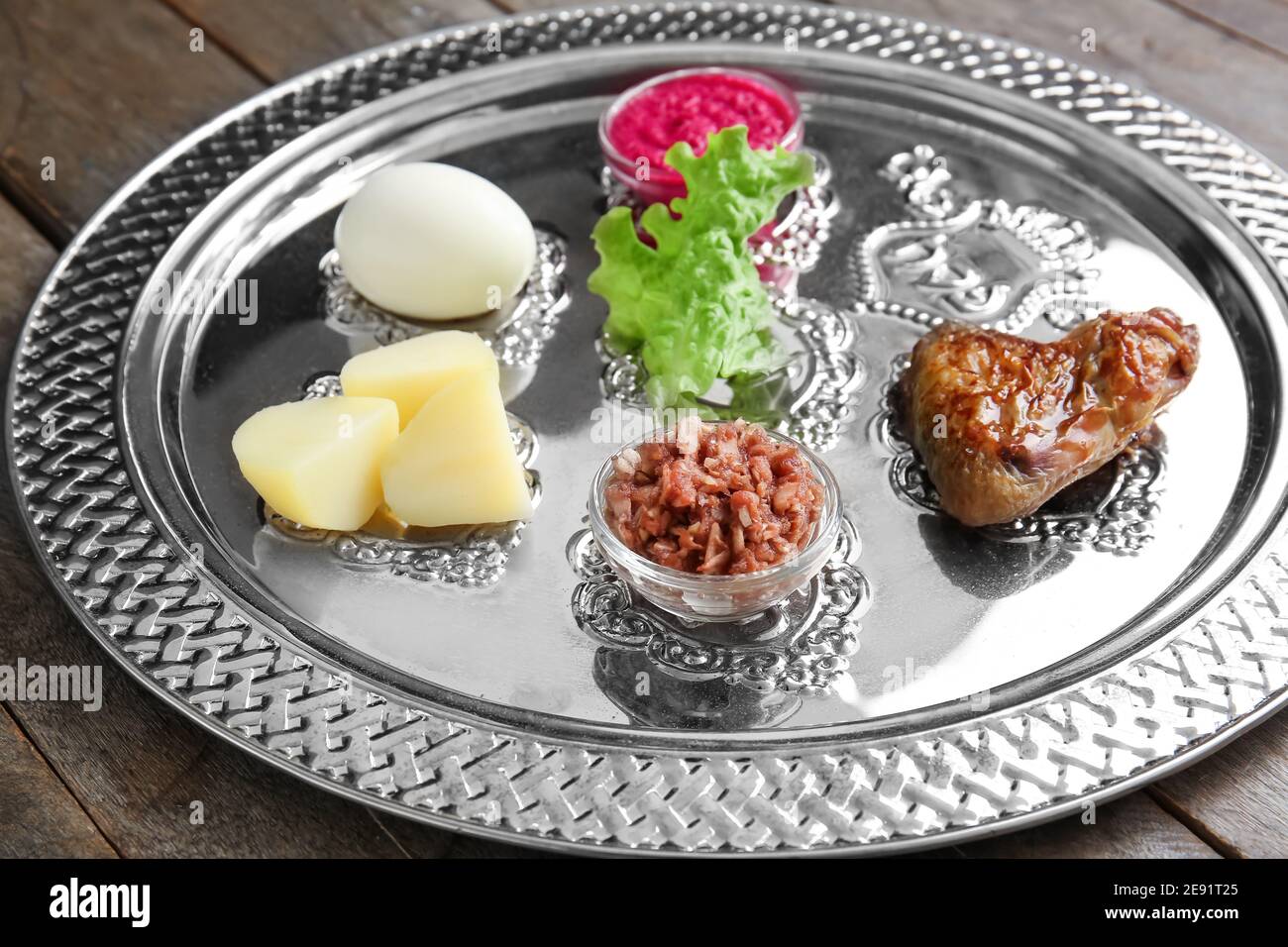 Passover Seder plate with traditional food on table, closeup Stock ...