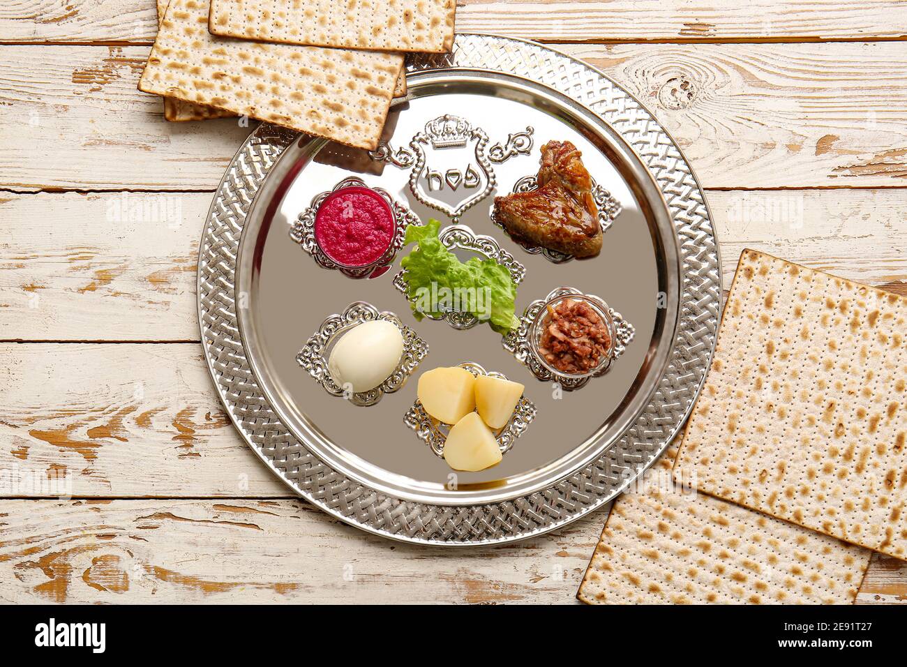 Passover Seder plate with traditional food on table Stock Photo - Alamy