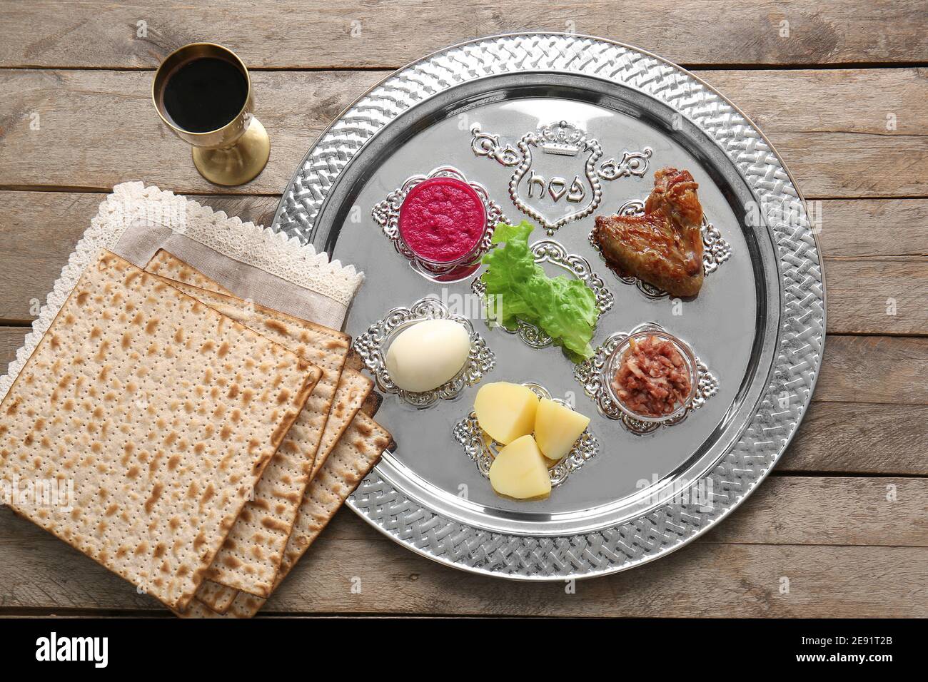 Passover Seder plate with traditional food on table Stock Photo - Alamy