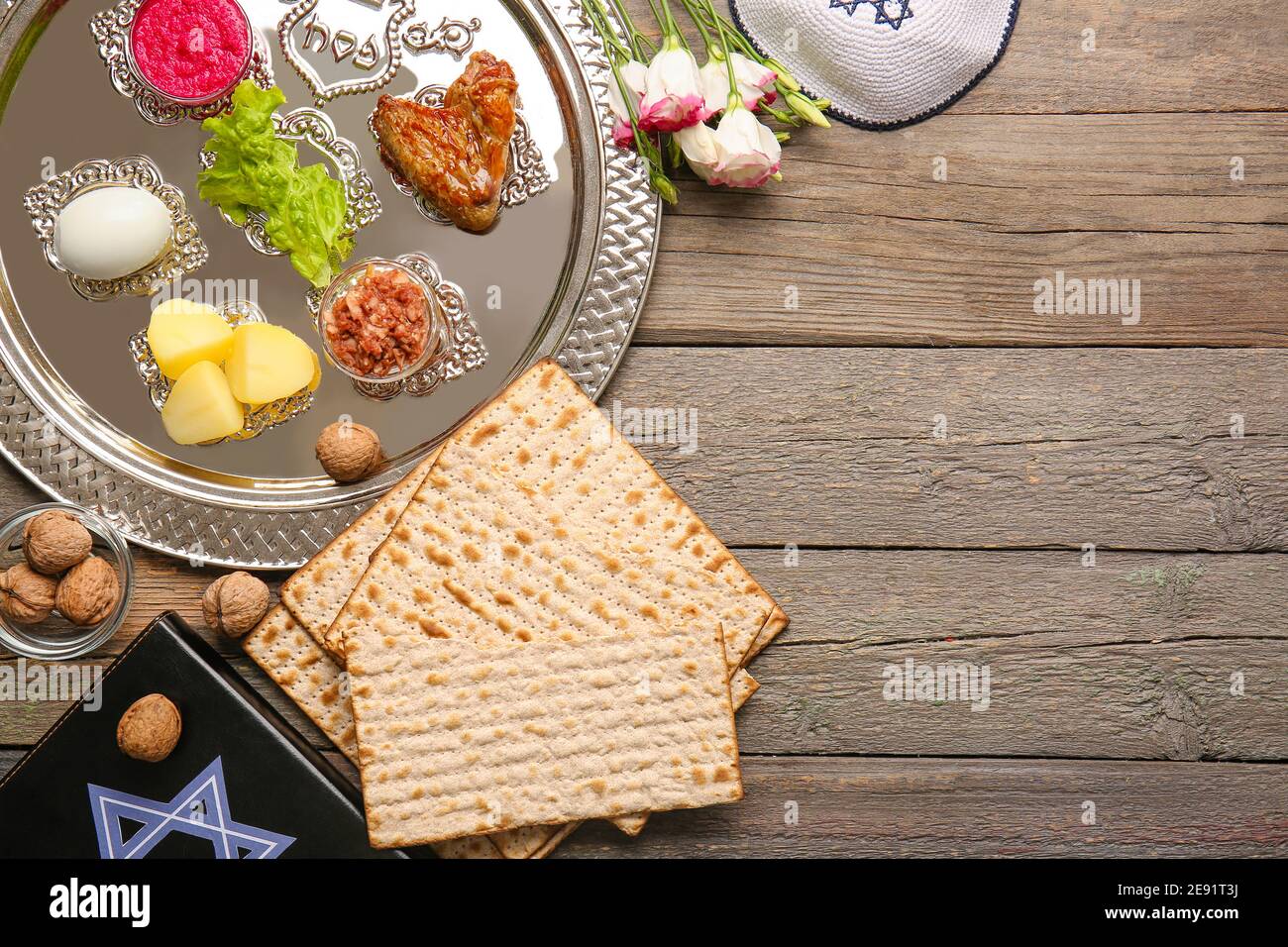 Passover Seder plate with traditional food on table Stock Photo - Alamy
